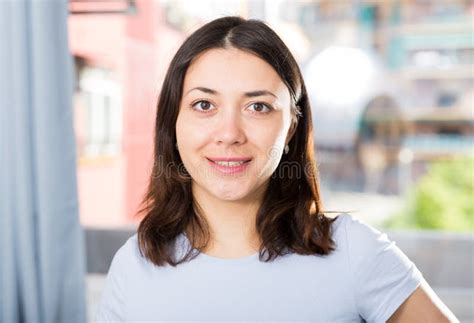 Positive Girl Having Good Time Standing In Home Interior Stock Image