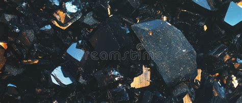 Obsidian Texture Showcasing Glassy Finish And Sparkling Gold Glitters