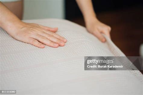 Women Making Bed Photos And Premium High Res Pictures Getty Images