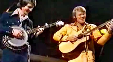 See Glen Campbell Perform Iconic Dueling Banjos With Young Musician