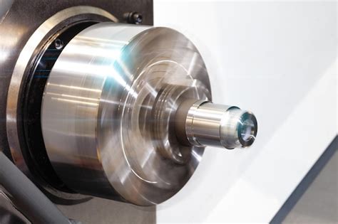 Premium Photo Cnc Lathe Machine Or Turning Machine With Rotating Spindle With Metal Part