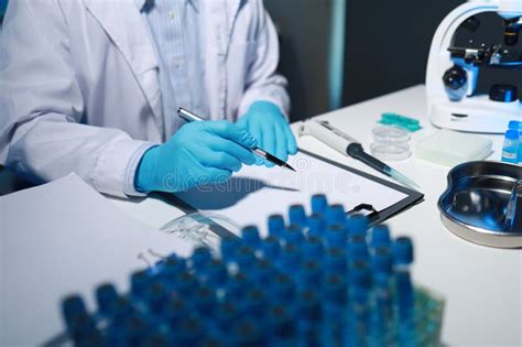 A Researcher Is Taking Notes It Is Being Developed In The Lab As A Profile For Other