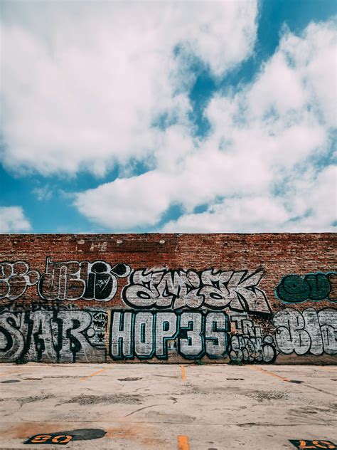 Brown Graffiti Wall Photo Free Art Image On Unsplash