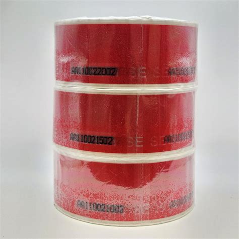 Three Rolls Of Red Perforated Security Tape With Sequential Numbers Indicating Use For Tamper