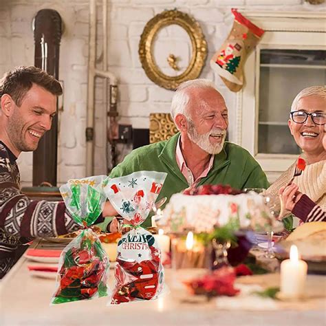 Badu Bg 50 бр Коледни целофанови торбички за лакомства с усукани връзки Дядо Коледа Торбичка за