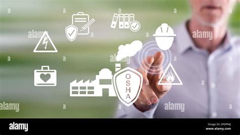 Man Touching An Osha Concept On A Touch Screen With His Finger Stock