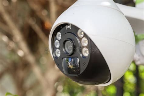 Security Ip Cctv Camera Using Solar Energy Install On The Tree For Home Security System Stock