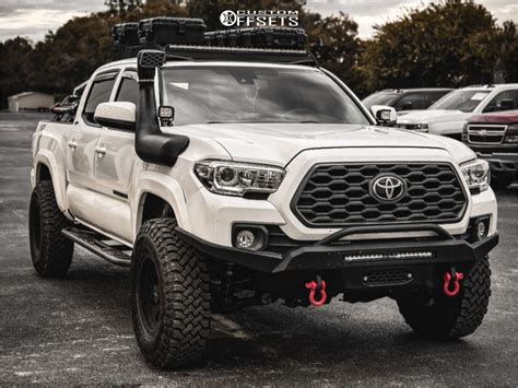 2019 Toyota Tacoma With 16x8 12 Pro Comp 69 And 25585r16 Falken Wildpeak Mt And Suspension