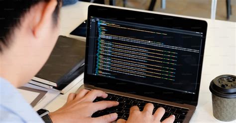 A Male Programer Working With Laptop And Coding On Computer Photo Computer Hacker Image On