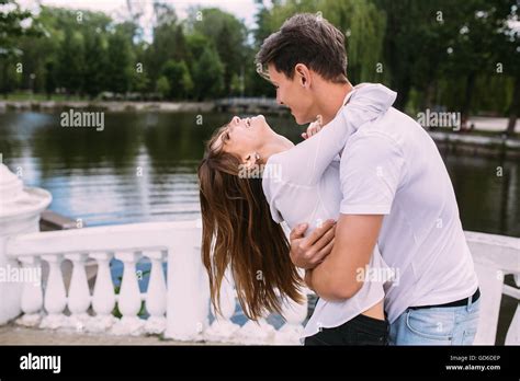 Guy Hugging His Girlfriend Stock Photo Alamy