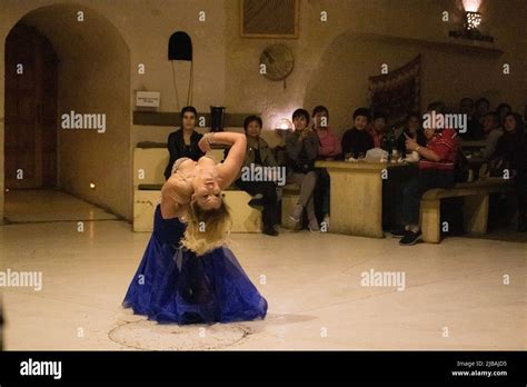 A Turkish Female Dancer Performing A Küçek Belly Dance For Tourists In A Local Restaurant Stock