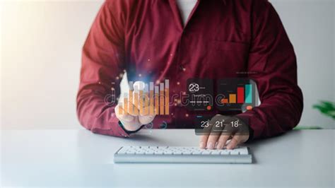Person Typing On Keyboard With Hologram Graphs Showing Status For