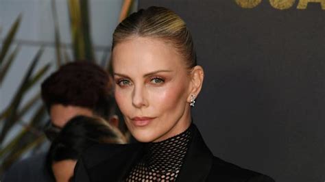 Charlize Therons Shocking Youthful Look In New Pics Has Fans Stunned As Plastic Surgeon Weighs In