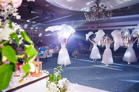 Girls Dancers In Beautiful Stage Costumes Dancing At A Festive Banquet