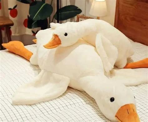 Мяка іграшка Гусак Кіт батон Мякі тапки Мякі мультяшні герої 250 грн Мякі тварини Івано