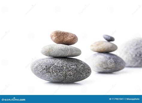 Stones Stacked On Top Of Each Other And Balanced On The White Stock Image Image Of Balanced