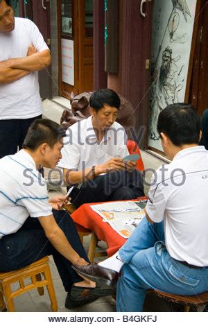 Men Playing Cards In A Village In Kumrokhali Village West Bengal