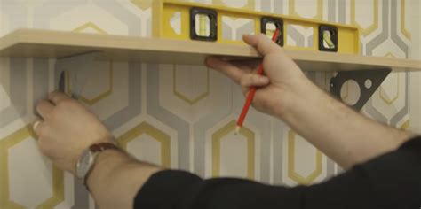 How To Put Up A Shelf A Guide To Hanging Shelves On The Wall With Brackets Real Homes