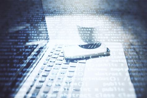 Premium Photo Laptop And Smartphone On Table With Coding Backdrop