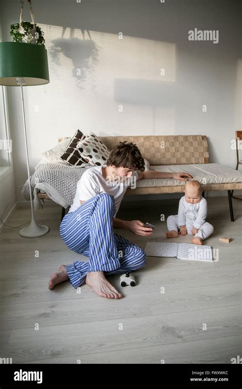 Father And Son In Living Room Hi Res Stock Photography And Images Alamy