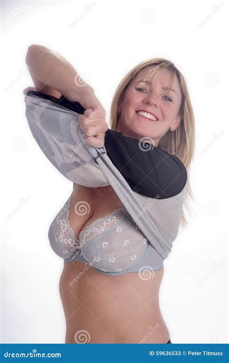 Woman Removing Her Clothing Stock Image Image Of Clothes Dressed