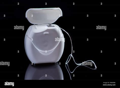 Container With Dental Floss Floss On Black Background White Dental