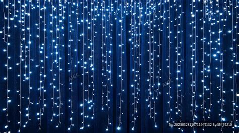 Ai创作图蓝色 灯串 垂挂 发光 装饰 闪烁 梦幻 氛围 灯光 背景 点缀 节日 庆典 派对 场景 昵图网