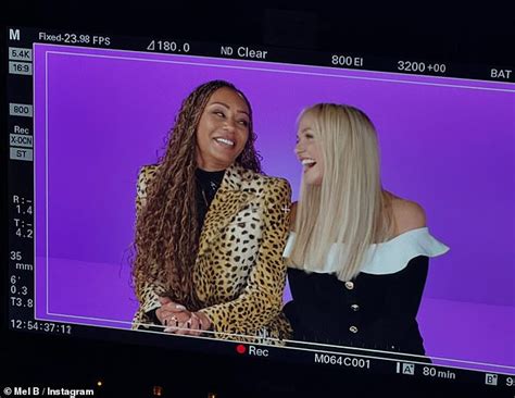 Mel B Puts On A Leggy Display In A Plunging White Lace Mini Dress As