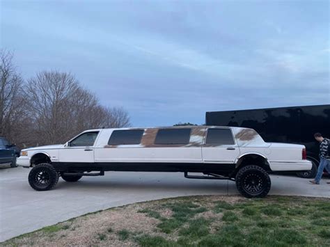 Nothing Says Class Like A Lifted Lincoln Town Car Limo With A Cowhide