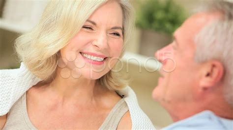 Mature Couple In Close Up Laughing Together Stock Footageclosecouple