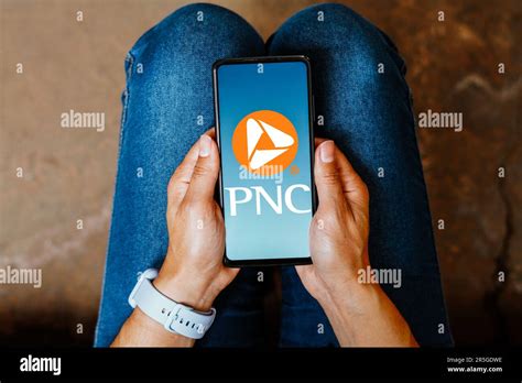 In This Photo Illustration The PNC Financial Services PNC Bank Logo Is Displayed On A