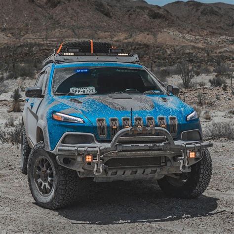 Blue Cherokee Trailhawk With 17” Black Reinforced Wheels Jeep