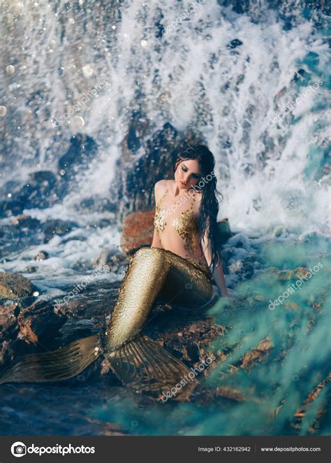 Fantasy Mermaids On Rocks