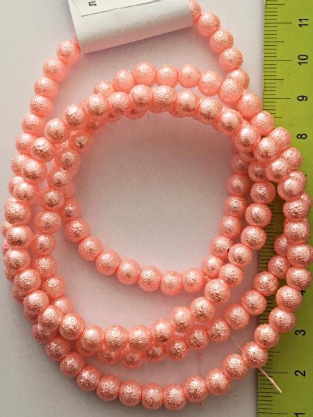 Стъклени перли 6мм релеф отвор 1мм ~80см ~140 броя цвят розов 1 наниз Мартеници Петя