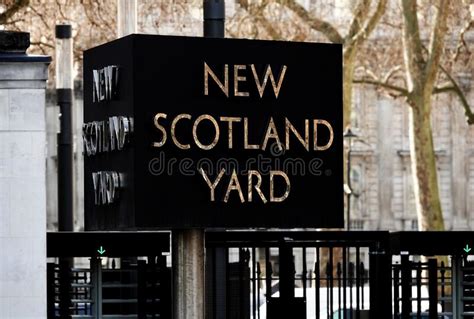 New Scotland Yard Revolving Sign Outside The Metropolitan Police Hq On