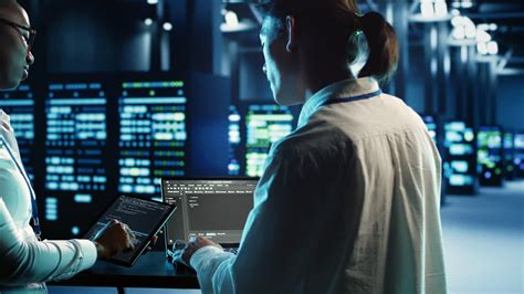 Coworkers Programming In Data Center Premium Stock Video Footage
