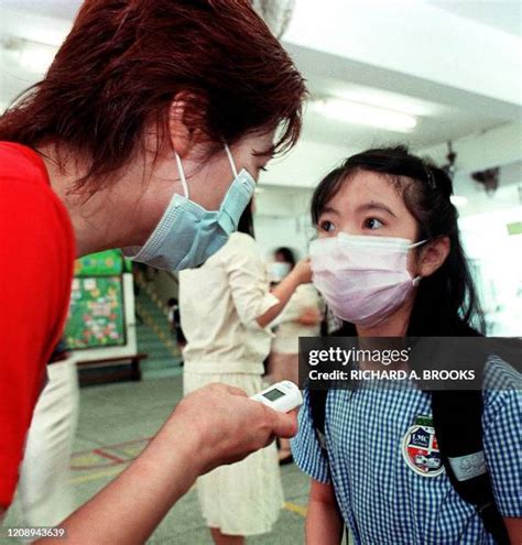Thermometer Girl Photos And Premium High Res Pictures Getty Images