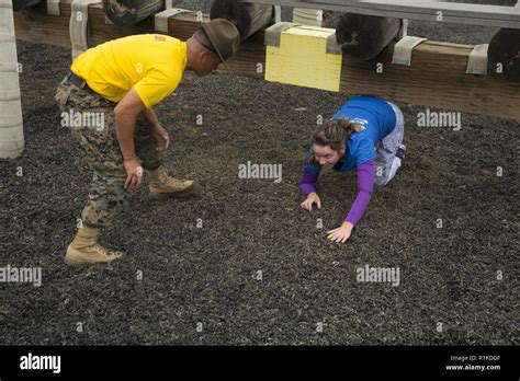 Participants Are Motivated Through Obstacles During The 17th Annual