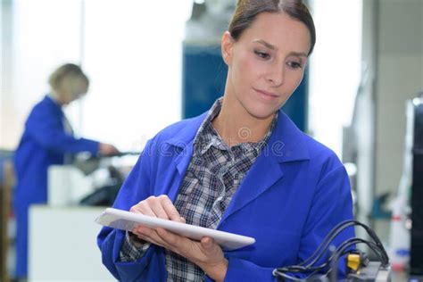 Female Engineer Holding Tablet Computer Stock Photo Image Of Adult Communications