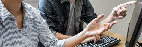 writing codes and typing data code technology programmer team working on web site project in a