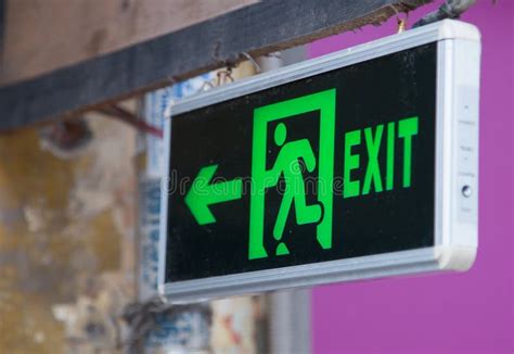 Exit Sign Points The Way Out Stock Image Image Of Close Flee 70084211