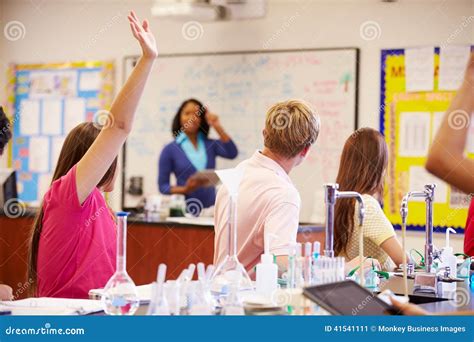 Teacher And Pupils In High School Science Class Royalty Free Stock