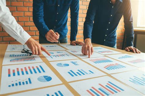 Business Team Analyzing Financial Reports And Charts Stock Illustration