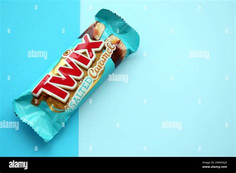 Ternopil Ukraine July 7 2023 Twix Salted Caramel Blue Wrapper On Wooden Background Twix Is