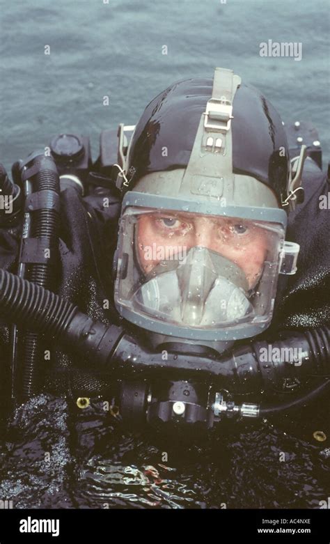 Military Eod Diver Wearing Full Face Mask With Built In Communications And Using A Rebreather