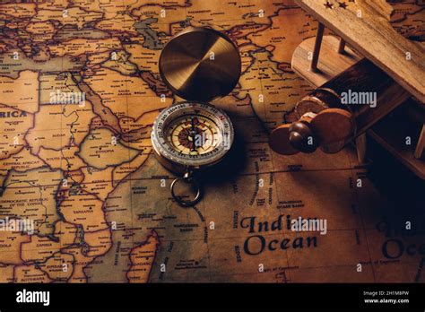 Old Compass Discovery And Wooden Plane On Vintage Paper Antique World Map Background Retro