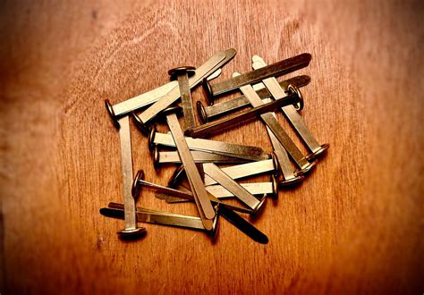 Pair Of Brass Shield Pins Triple Decka Leather