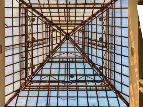 Image Shows An Architectural Interior With A Geometric Lattice