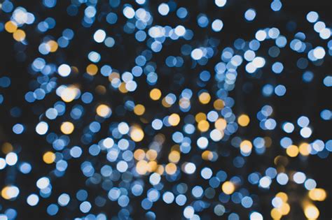 크리스마스 조명 축제 새해는 파란색 황금색과 검은 색 배경을 흐리게 아름다운 반짝이는 배경 질감 Bokeh 공간을 복사합니다