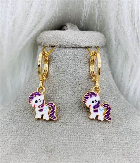 خرید و قیمت گوشواره بچه گانه طرح تک شاخ ترب